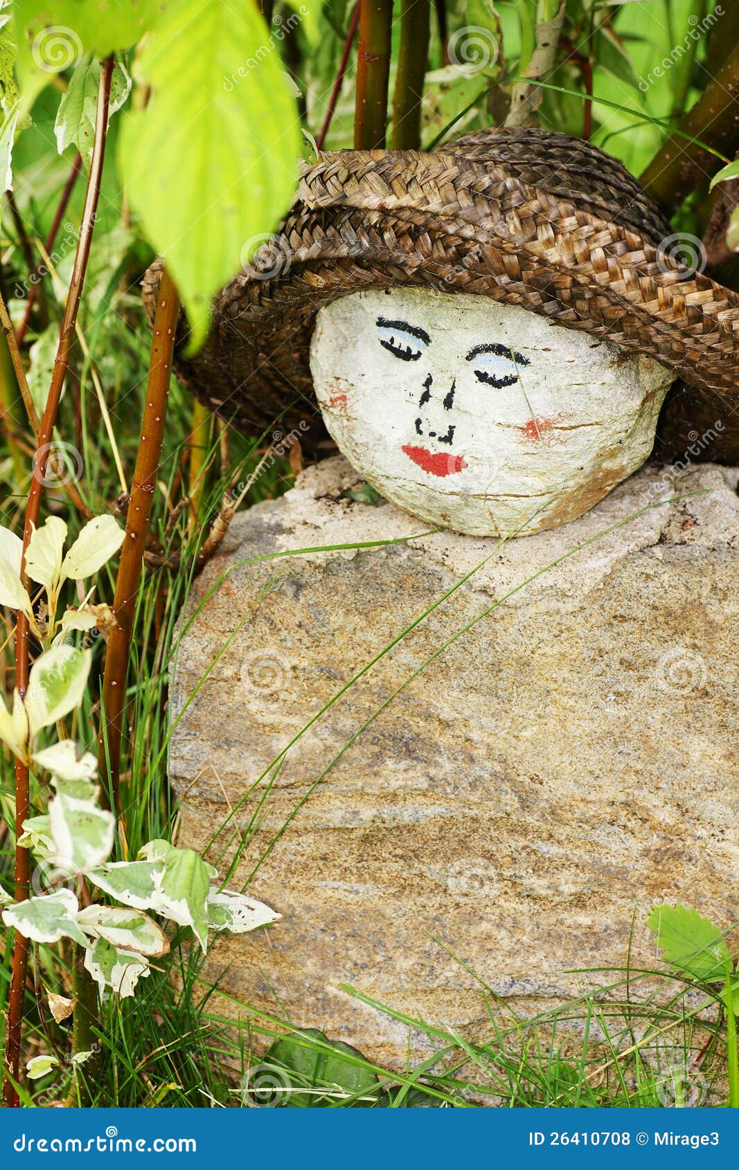 Painted Face on Rock Garden Decoration Stock Photo - Image of object ...
