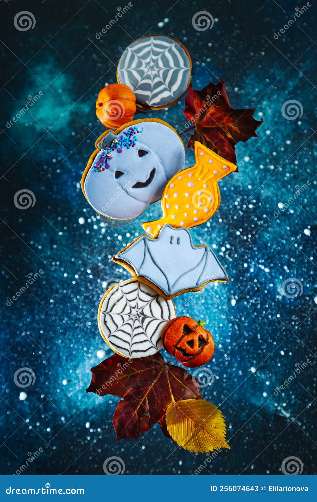 Painted Halloween Gingerbread and Autumn Leaves on Space Background ...
