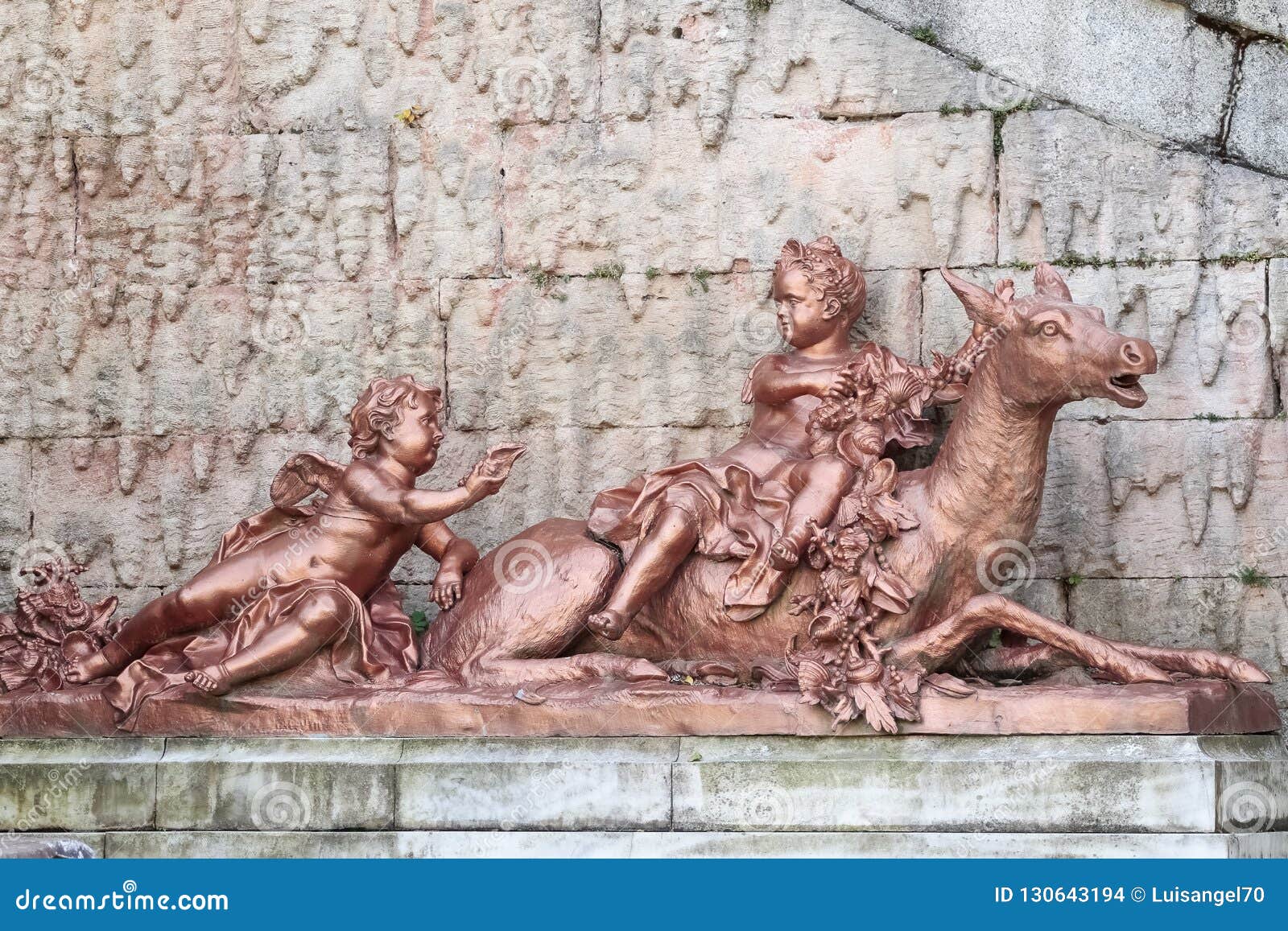 Two Cherubs Playing with a Female Roe Deer Stock Photo - Image of green ...