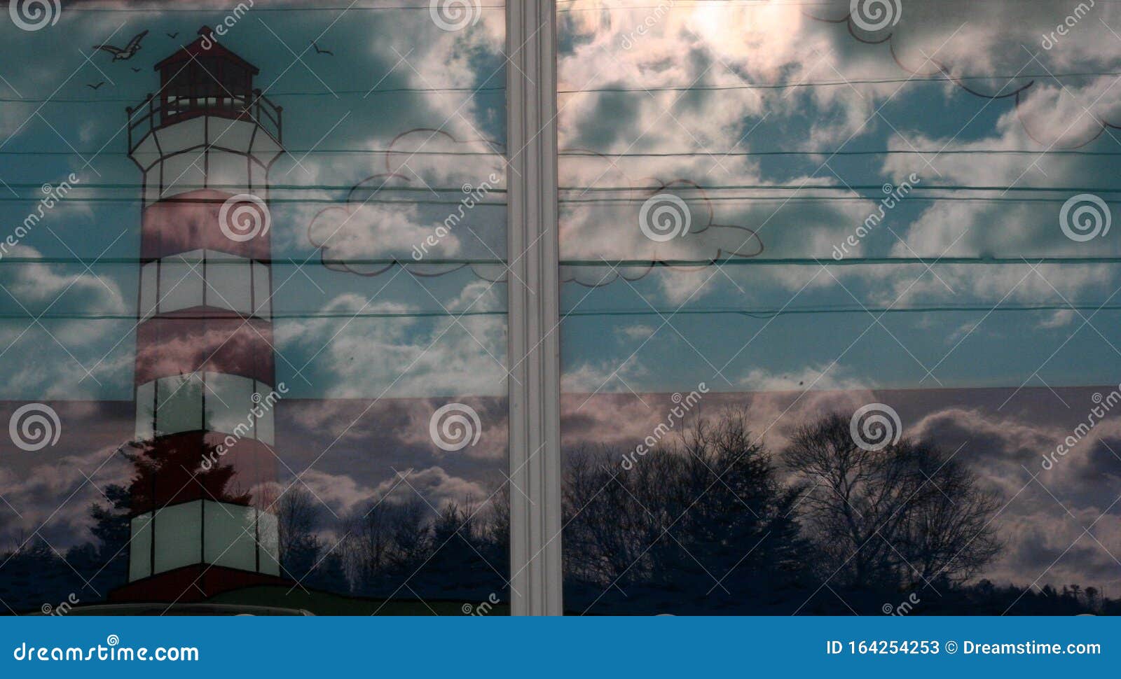 Painted Lighthouse on Glass Window Simultaneously Reflects Real Clouds ...
