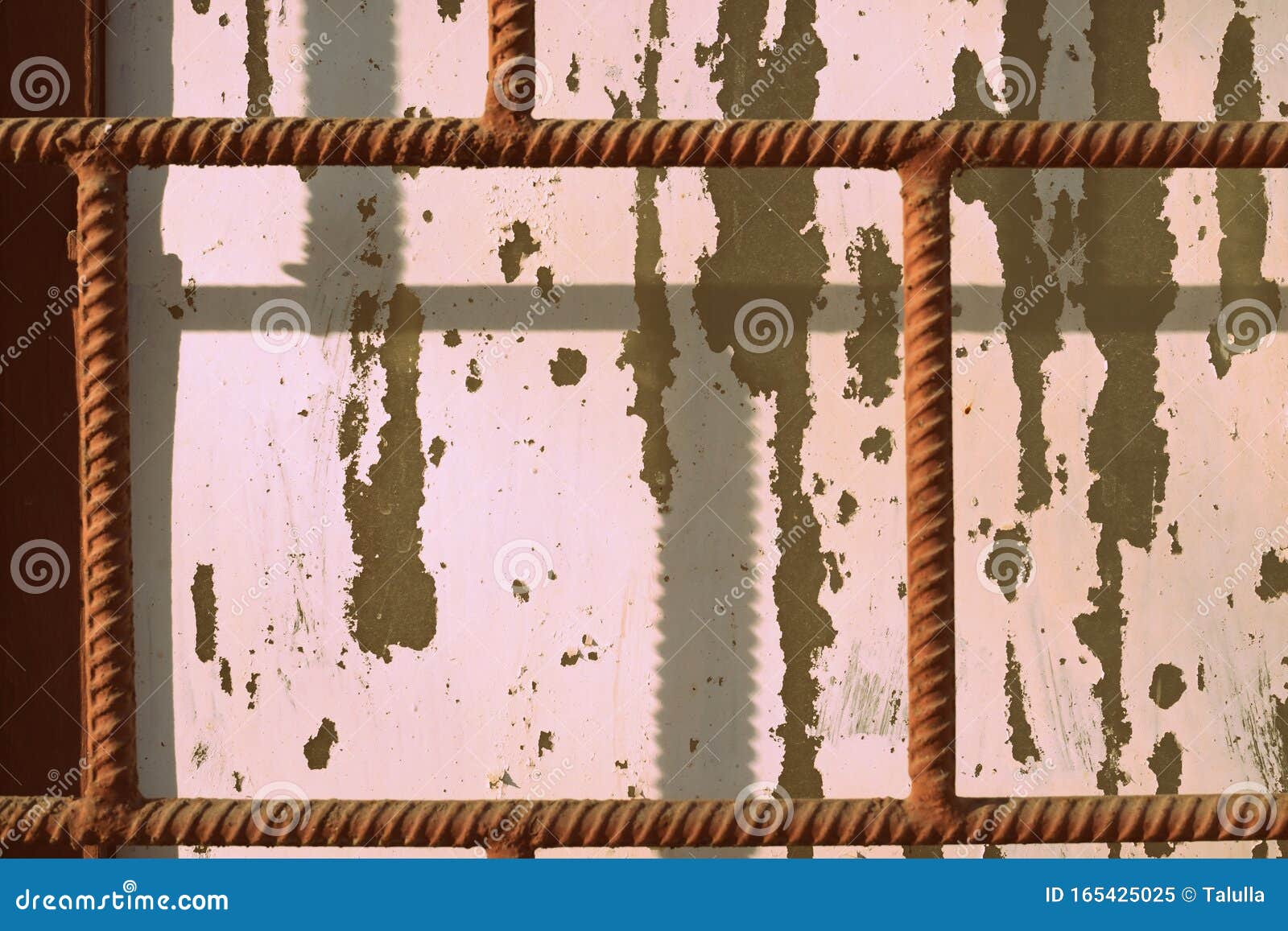 Painted Old Window Behind a Rusty Iron Bars Lit by Sun. Abstract ...
