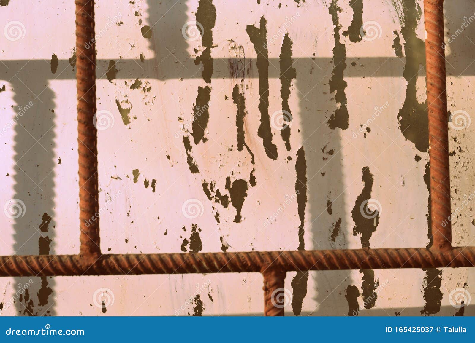 Painted Old Window Behind a Rusty Iron Bars Lit by Sun. Abstract ...