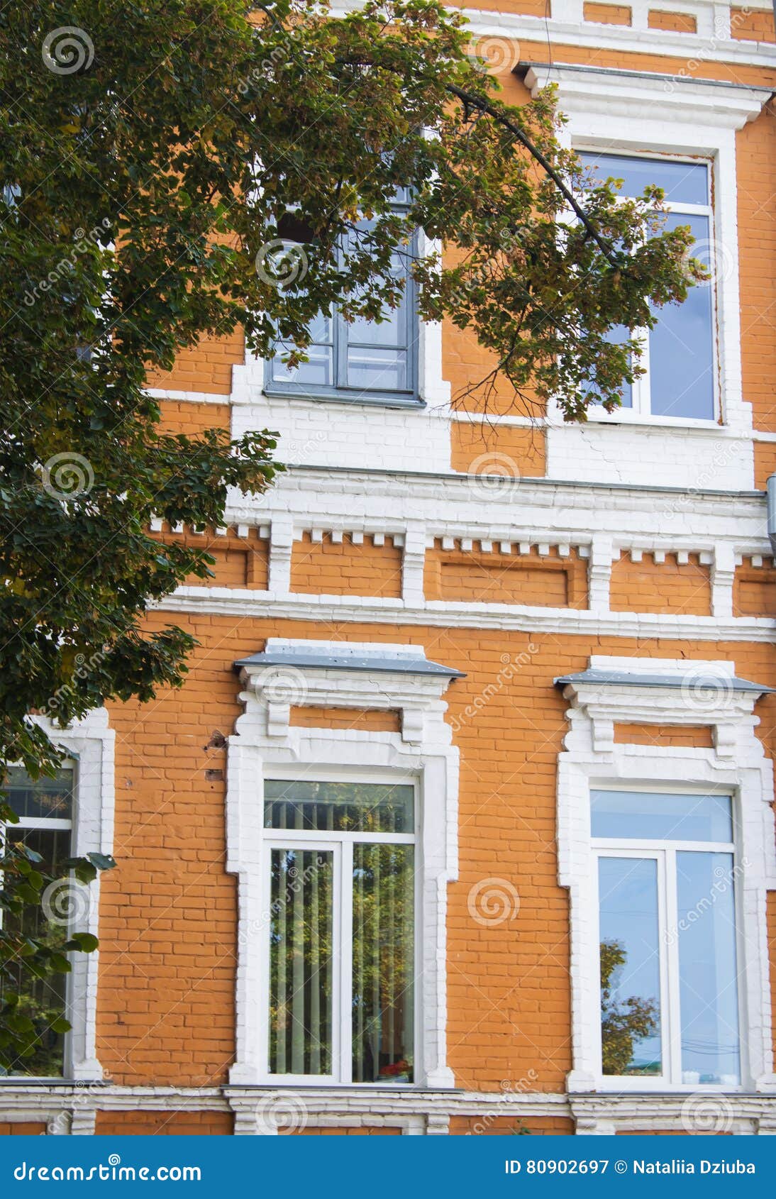 Painted Orange Brick Wall with Windows Stock Image - Image of detail ...