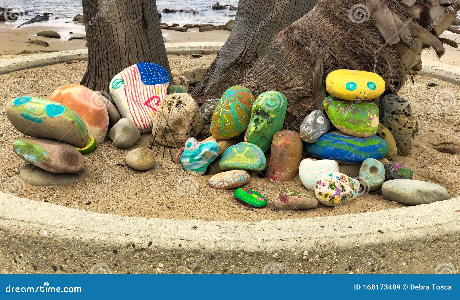 Painted rocks beach decor stock image. Image of beach - 168173489