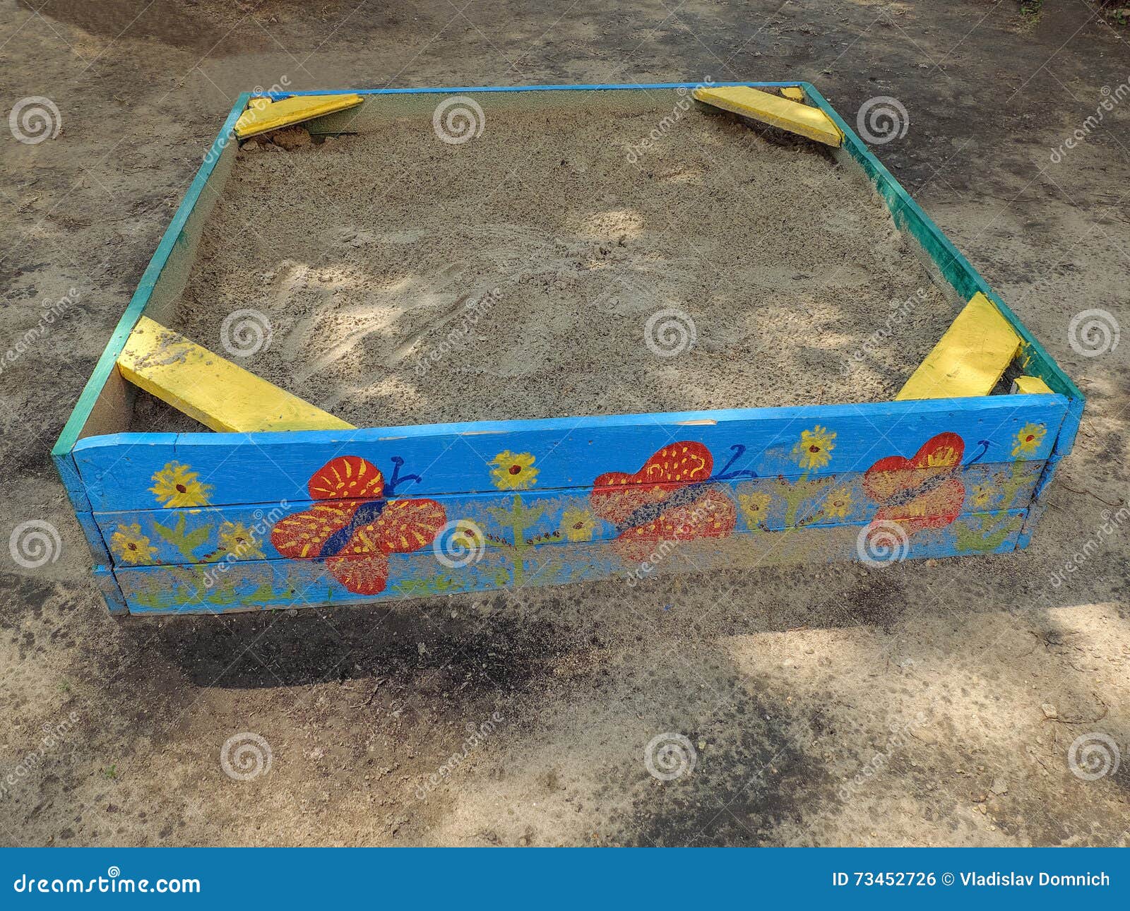 Painted sandbox after rain stock photo. Image of entertainment - 73452726