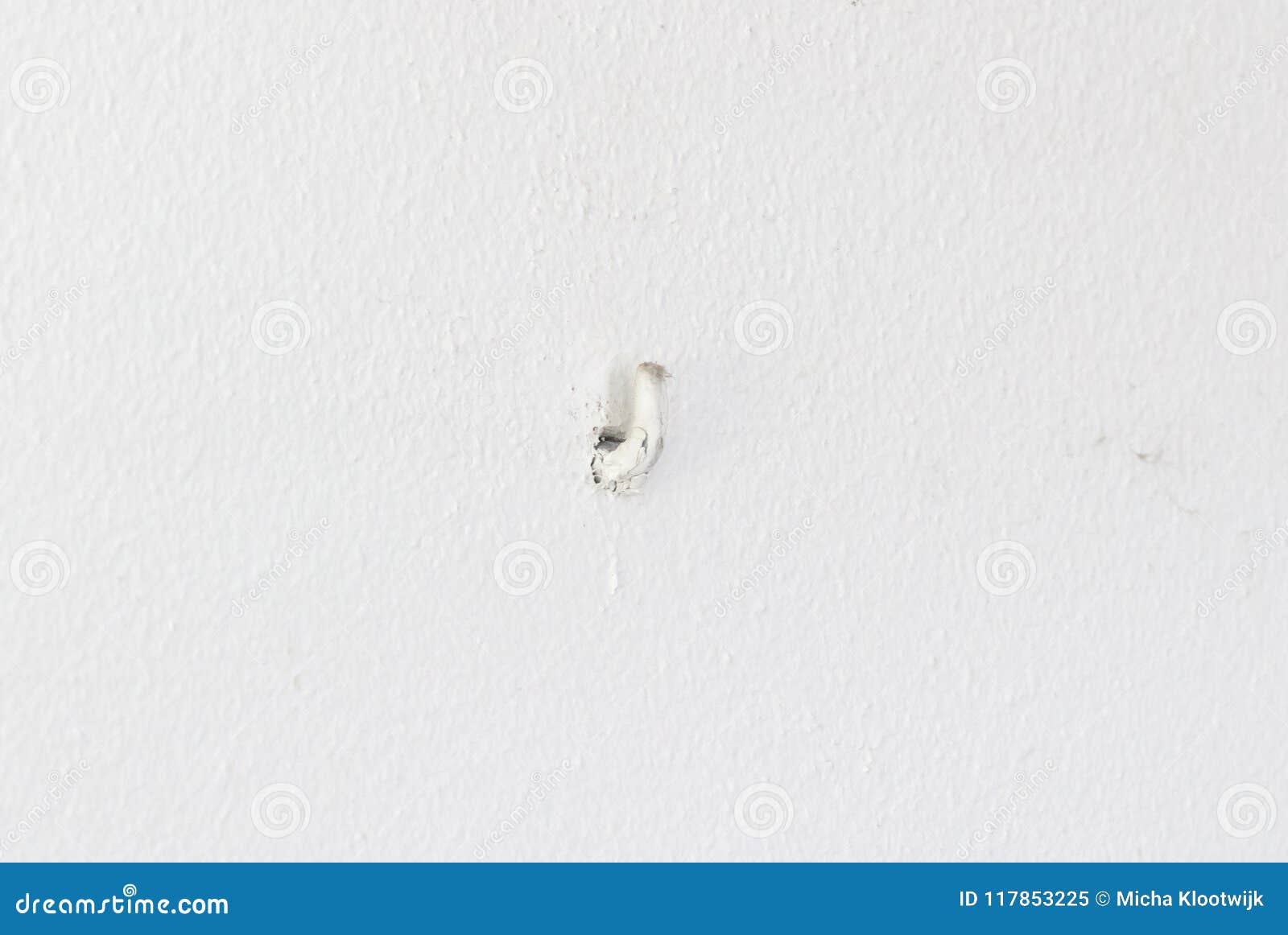 Painted Small Hook in a Wall Stock Image - Image of hook, metal: 117853225