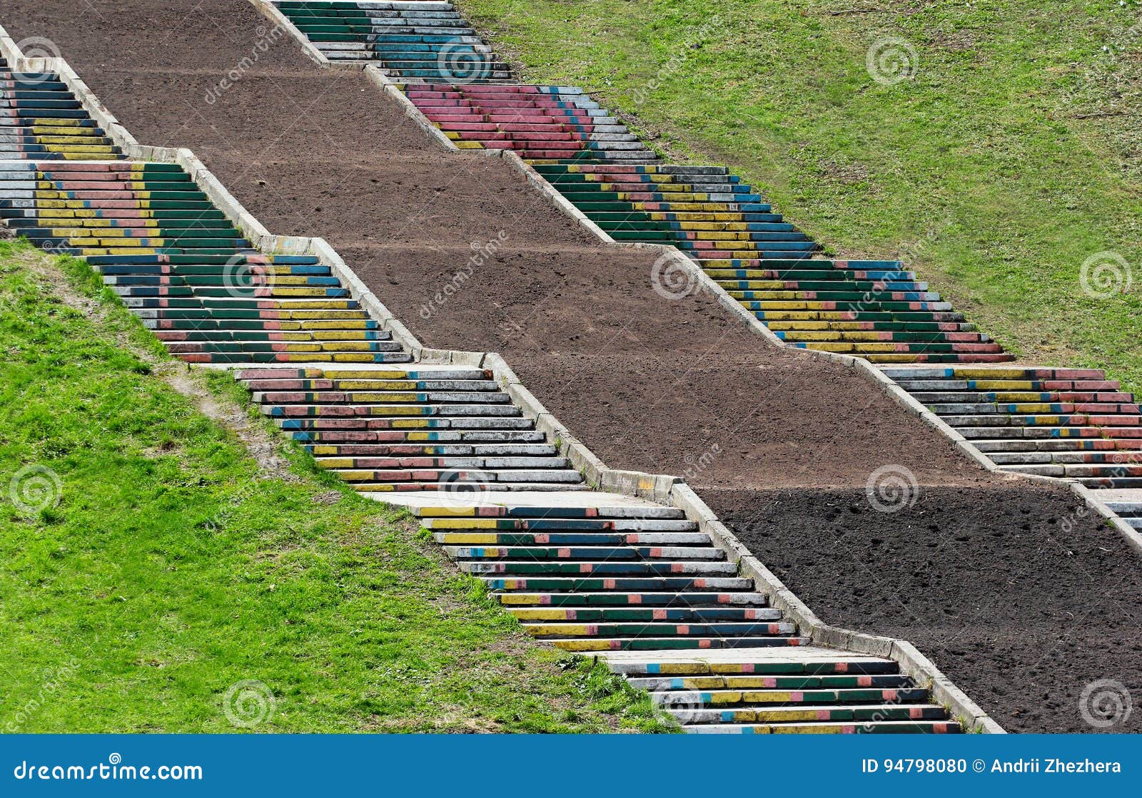 Painted Steps of Old Stairway on a Grassy Slope in a Park Stock Photo ...