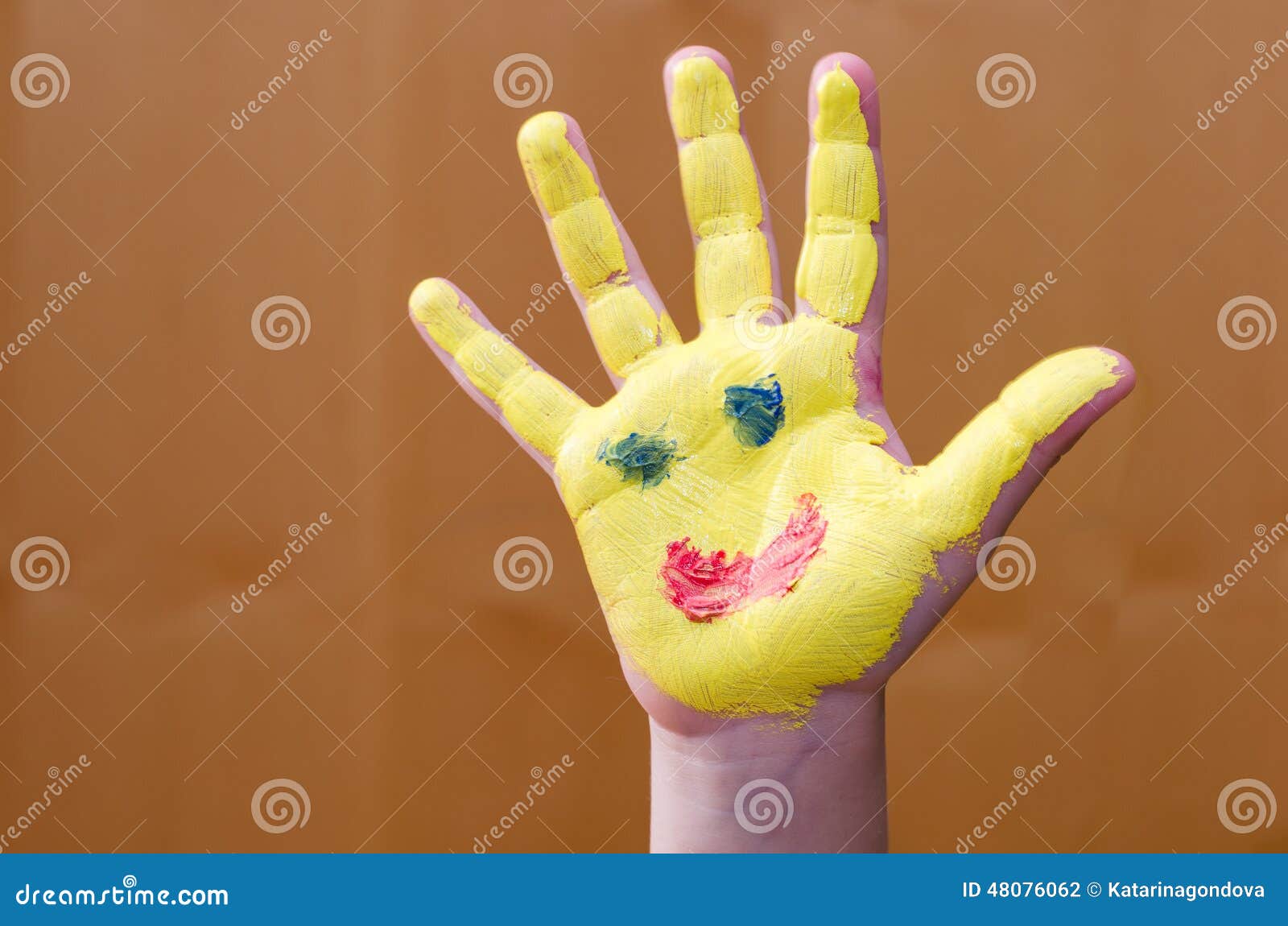 Painted sun on hand stock photo. Image of yellow, hand - 48076062