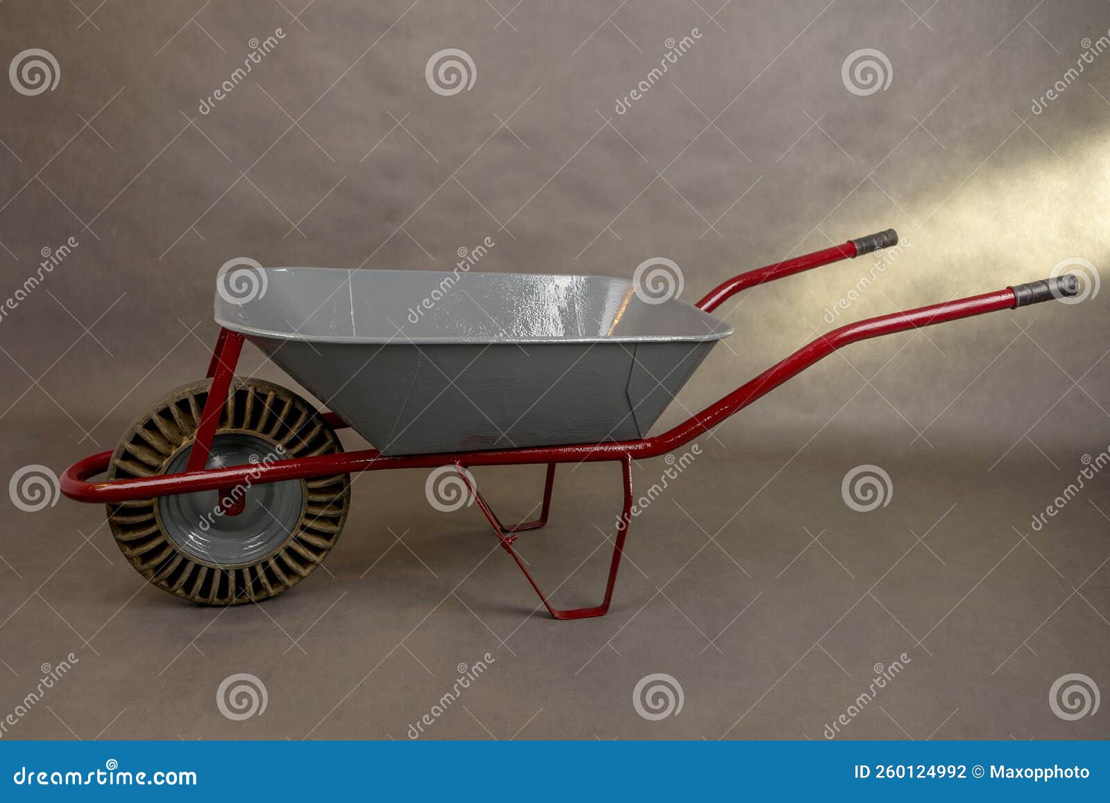 Painted Wheelbarrow on a Concrete Tiles Stock Photo - Image of work ...