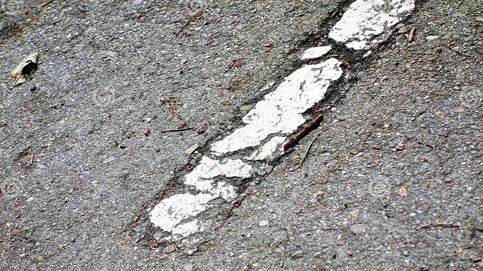 Painted White Line of a Road Eroded Stock Photo - Image of divide ...