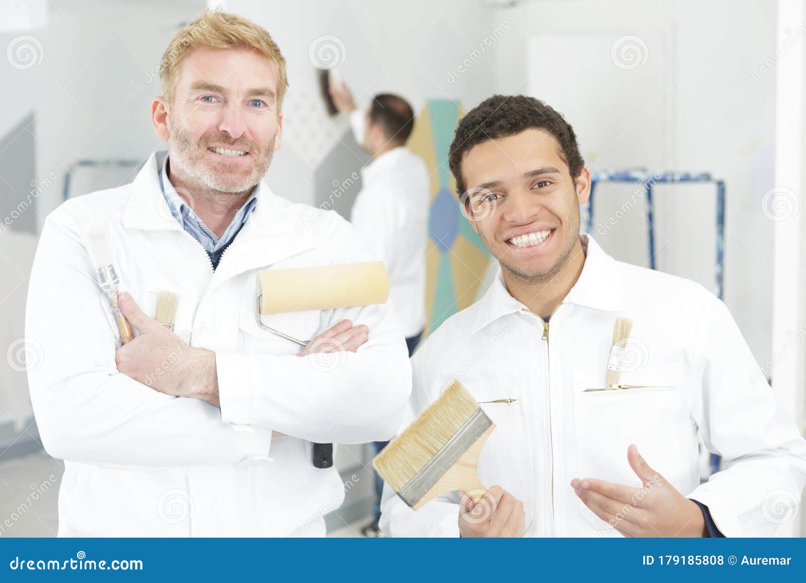 Painter with apprentice stock photo. Image of colour - 179185808