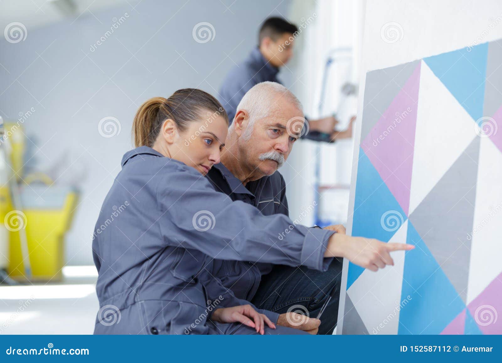 Painter with Apprentice in Training Room Stock Photo - Image of ...