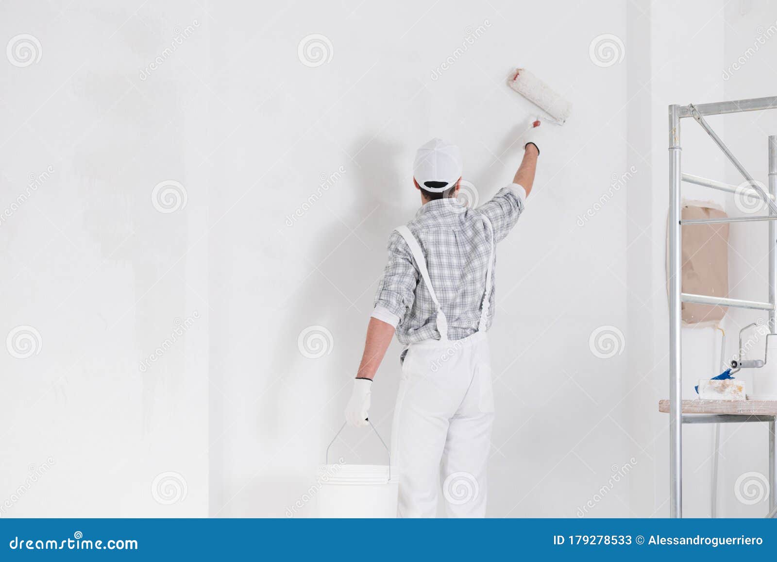 Painter or Builder Painting a Wall White Stock Image - Image of roller ...