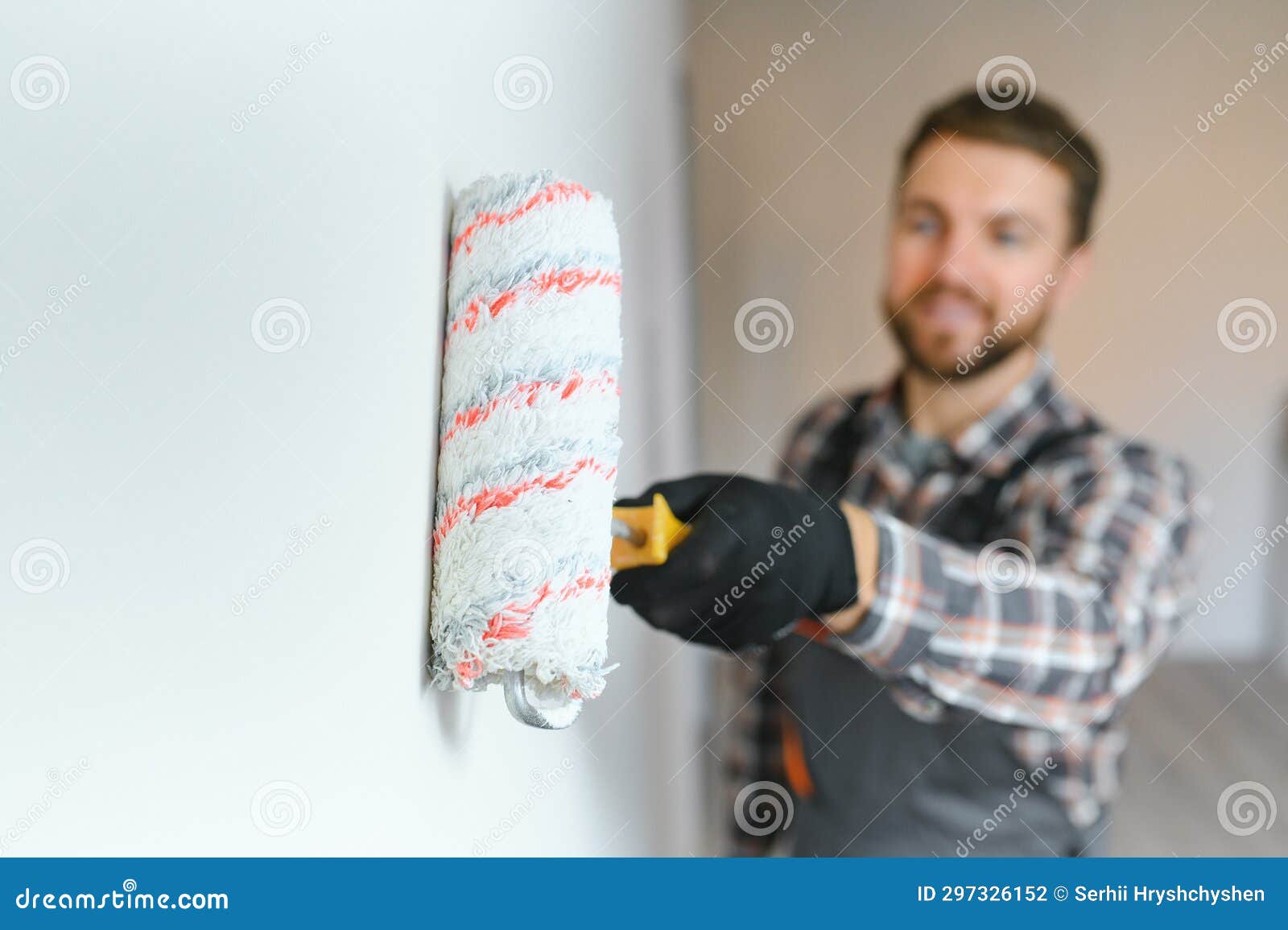 Painter Man Painting the Wall, with Paint Roller Stock Photo - Image of ...
