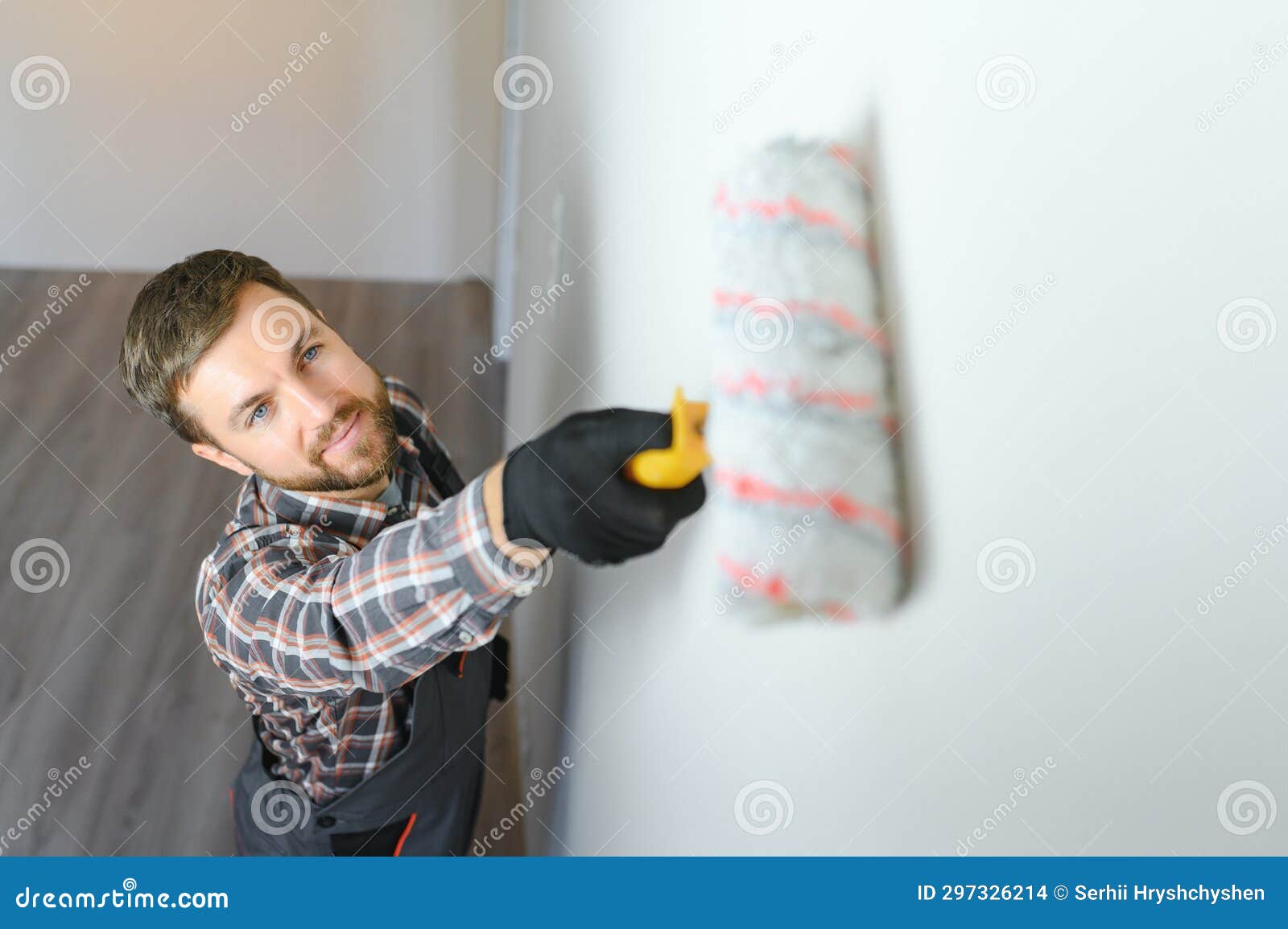 Painter Man Painting the Wall, with Paint Roller Stock Photo - Image of ...