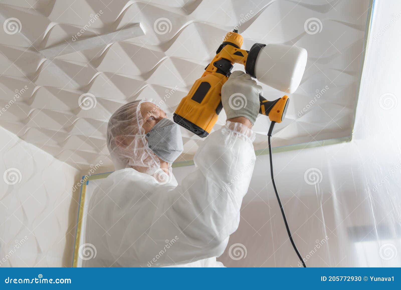 The Painter is Painting a Ceiling with a Spray Gun Stock Photo - Image ...
