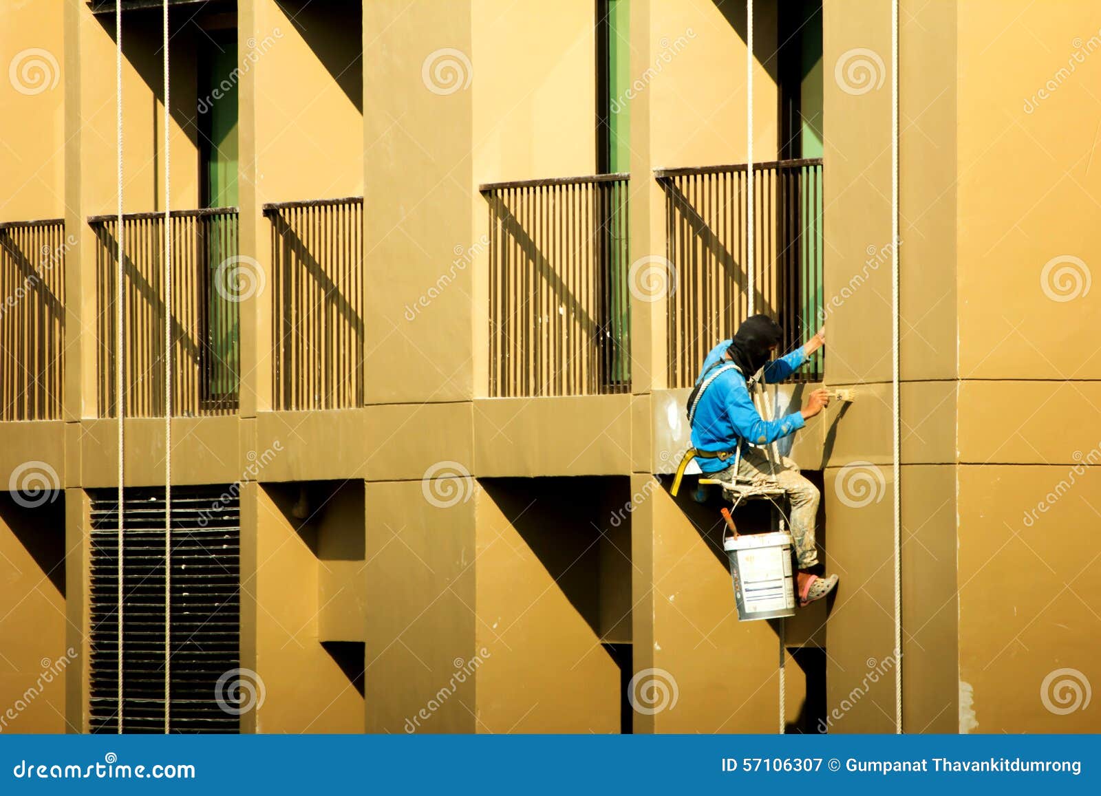 Painter Painting on High Rise Building Editorial Photography - Image of ...