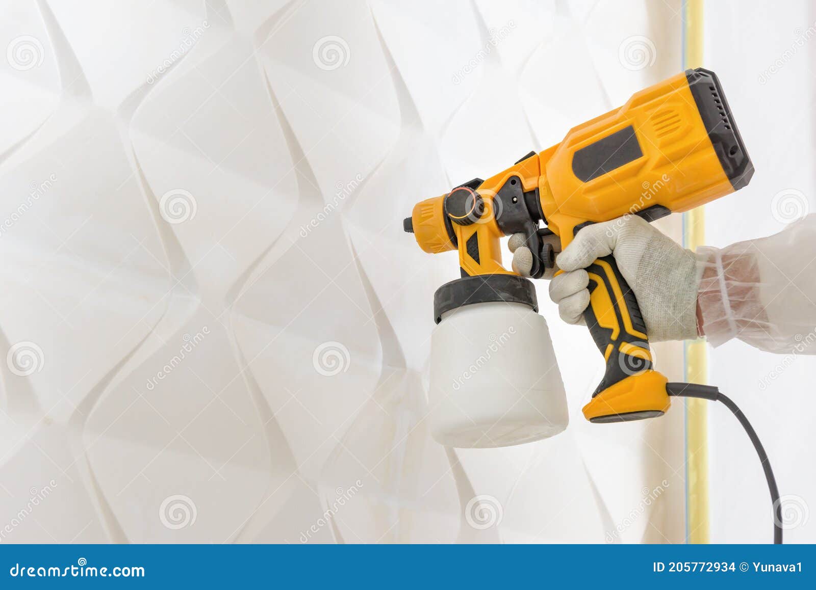 The Painter is Painting a Wall with a Spray Gun Stock Photo - Image of ...