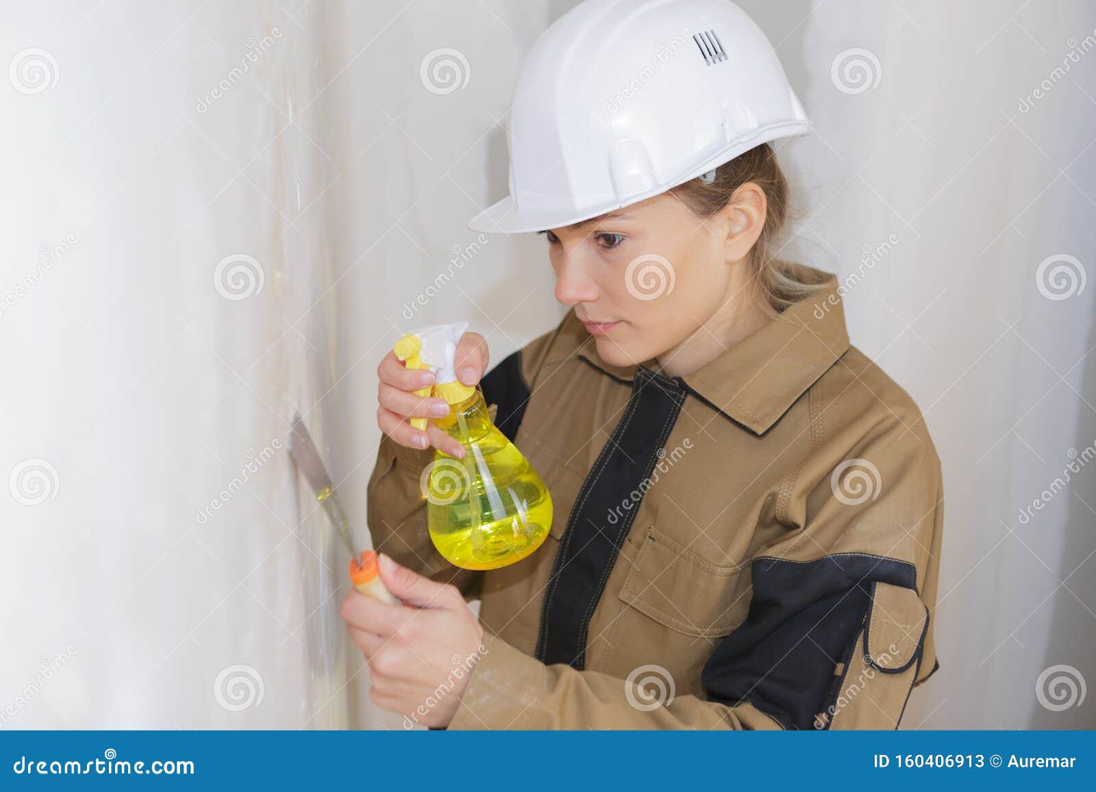 Painter scraping wall stock image. Image of protection - 160406913