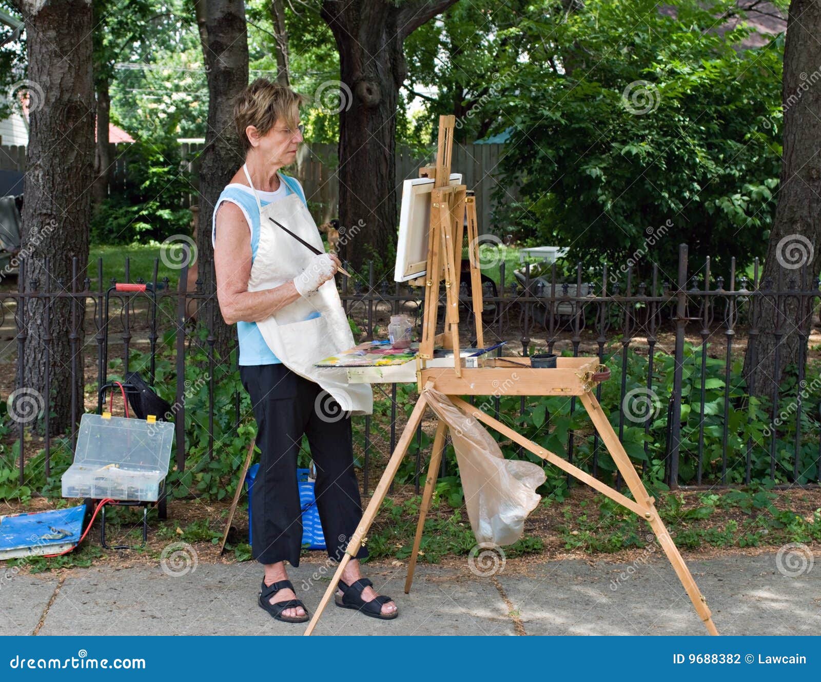 Painter Studying Her Work stock photo. Image of artist - 9688382