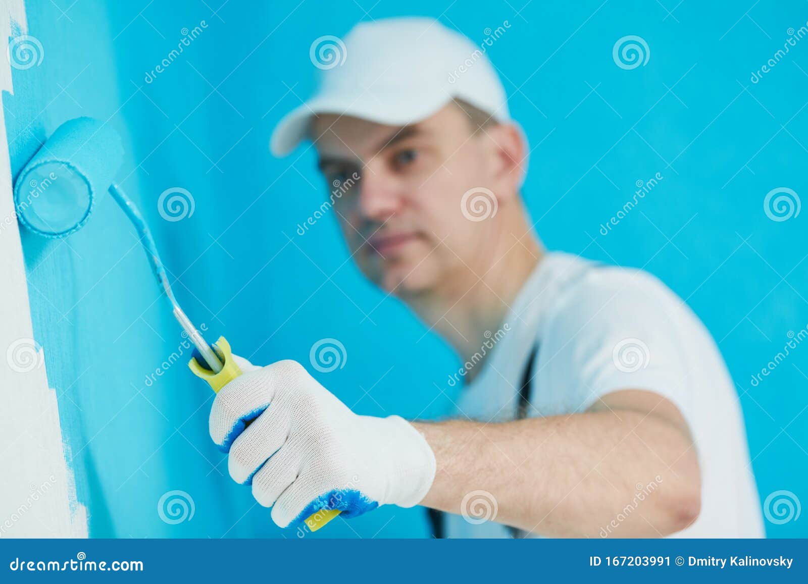 Painter Worker with Roller Painting Wall Surface Stock Image - Image of ...