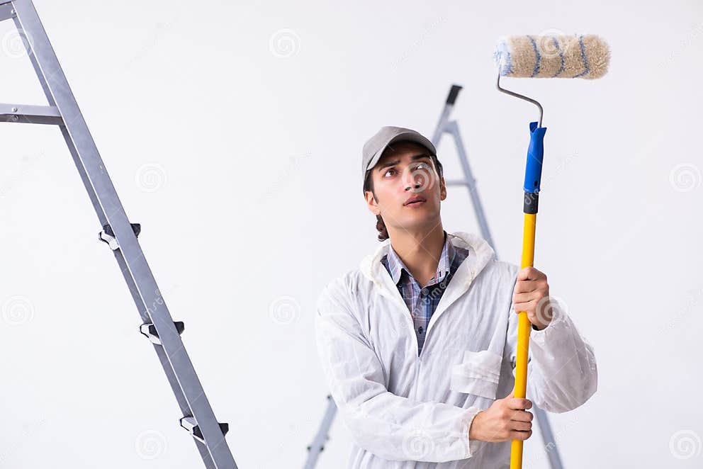 Painter Working at Construction Site Stock Photo - Image of improvement ...