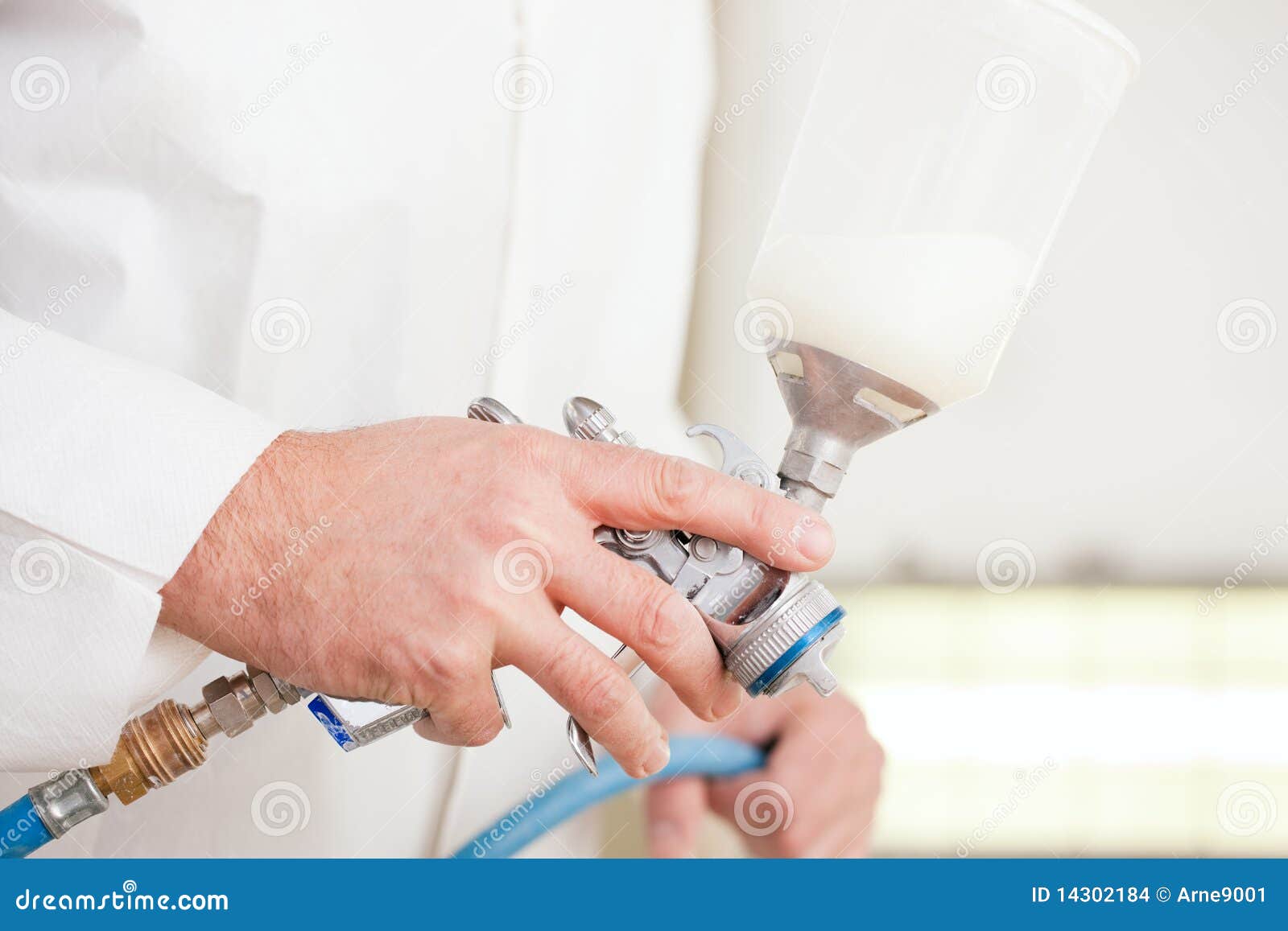 Painter Working with Spray Paint Stock Photo - Image of workwear ...