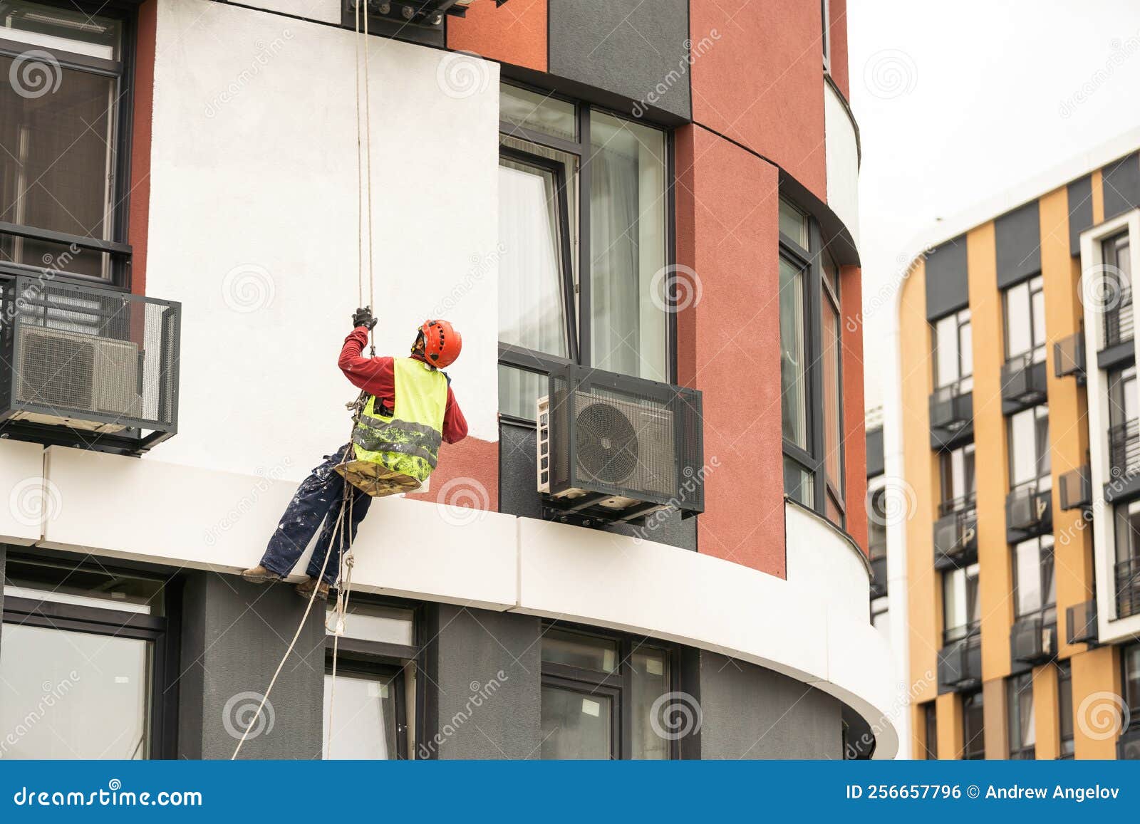 Painters-altitude Upgrade the Facade of the Building. Stock Photo ...