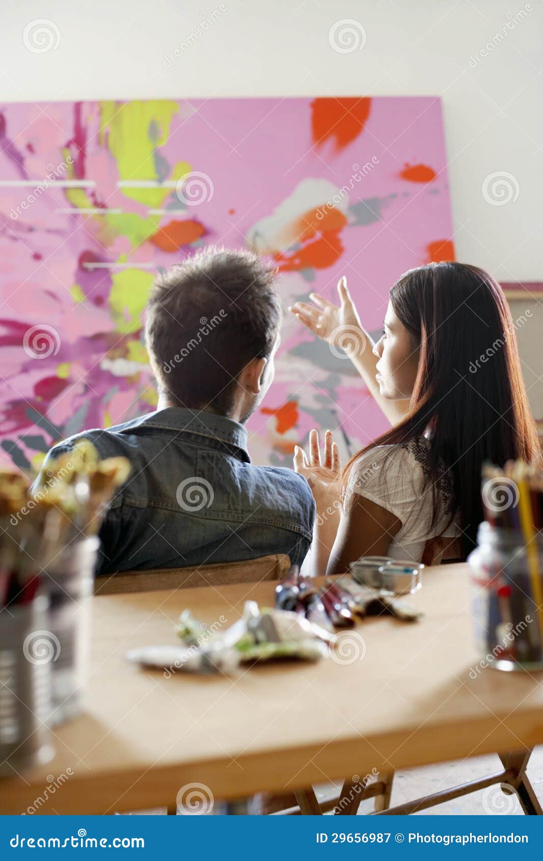 Painters in Discussion Over Painting Stock Image - Image of focus ...