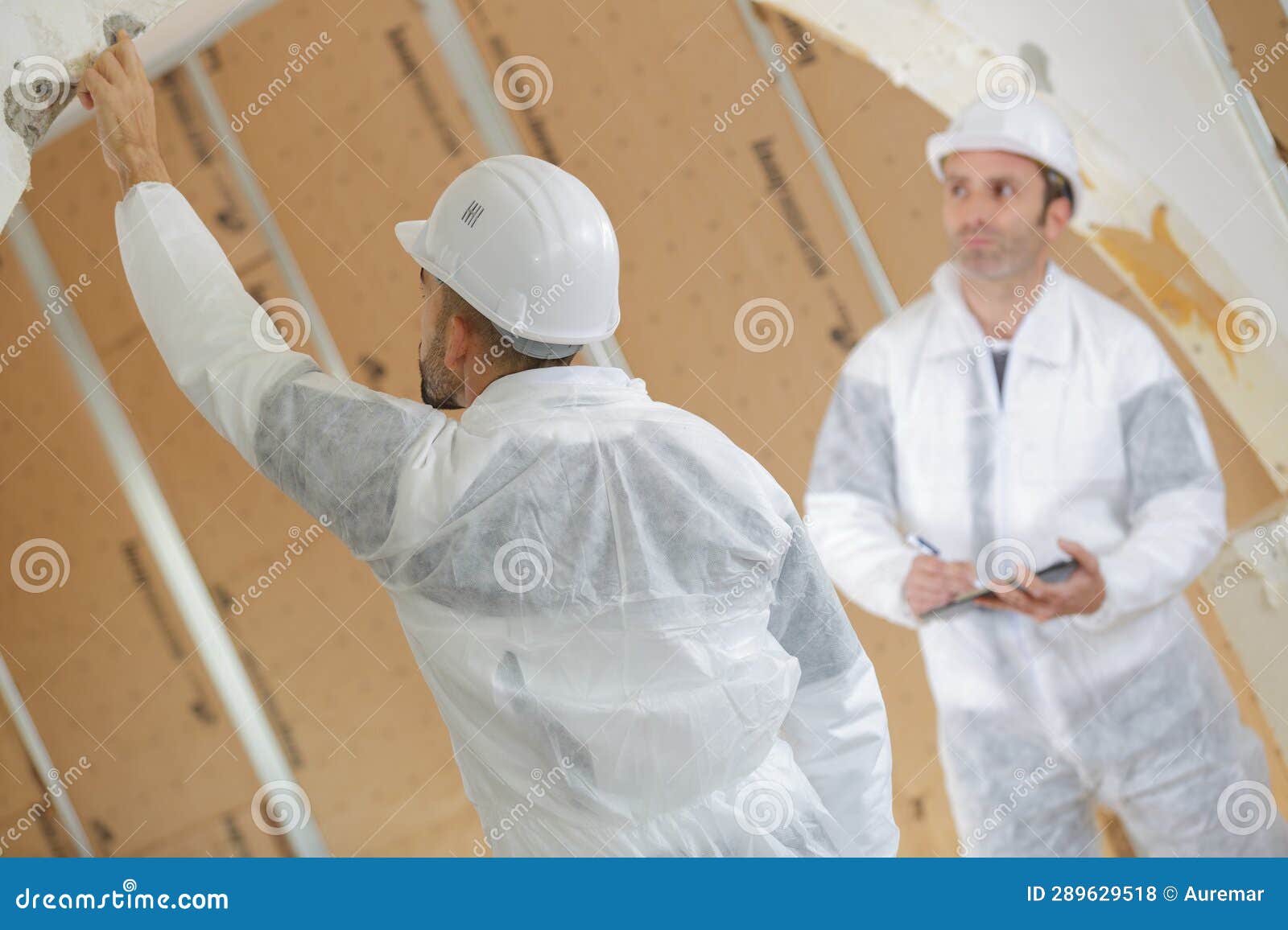 Painters at Work Inside Home Stock Photo - Image of construction ...