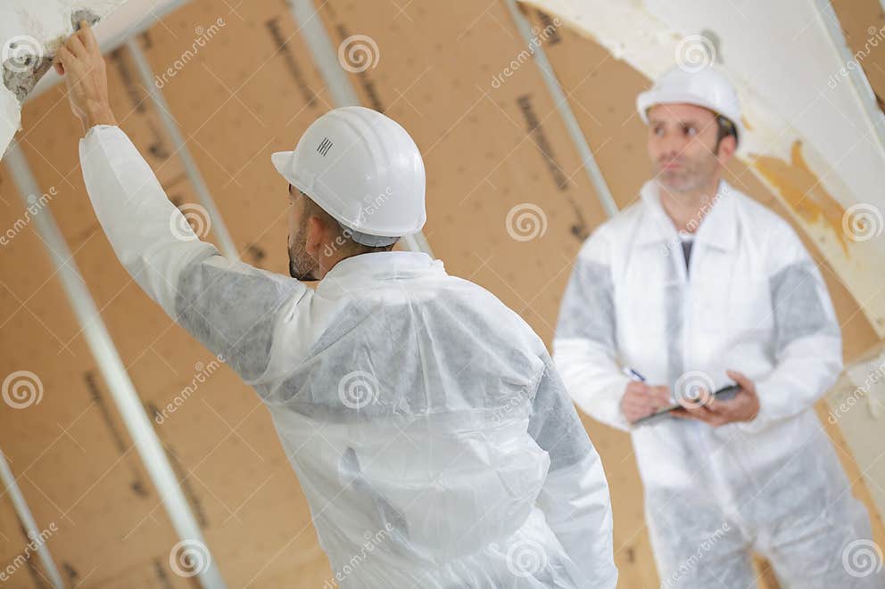 Painters at Work Inside Home Stock Photo - Image of construction ...