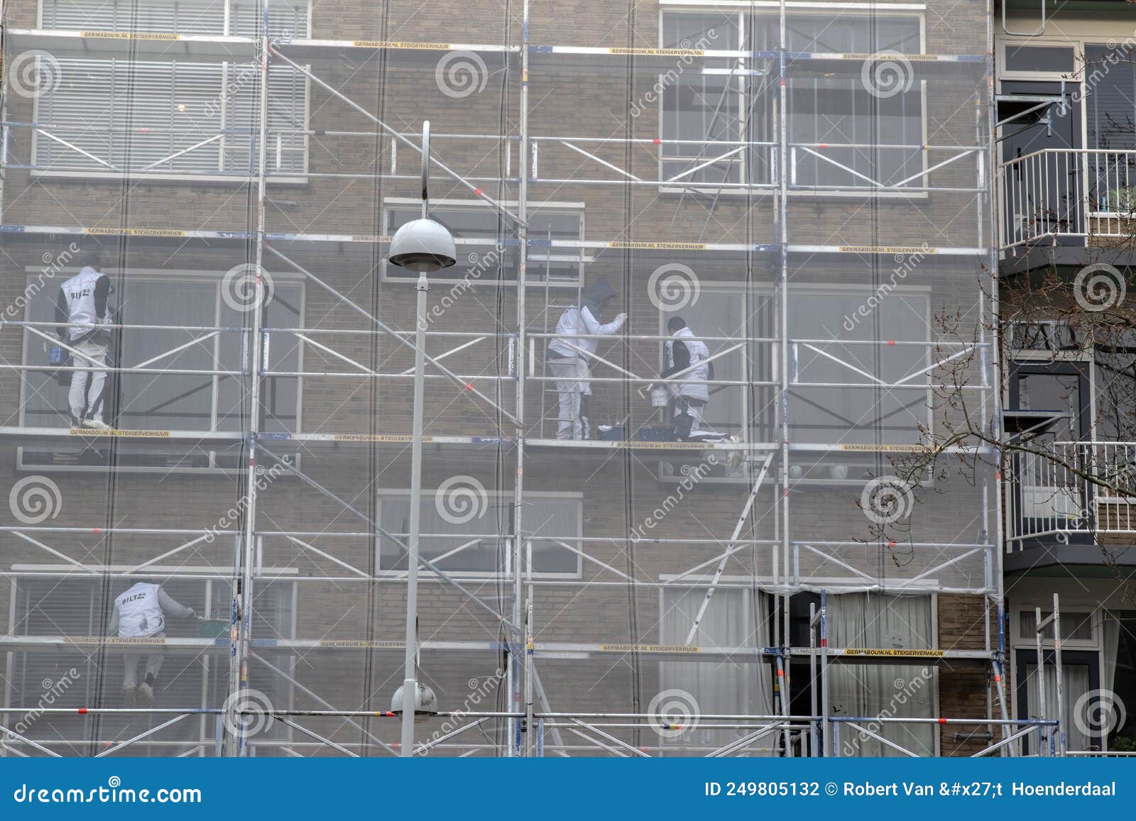 Painters at Work on Scaffolds at Amsterdam the Netherlands 9-12-2021 ...