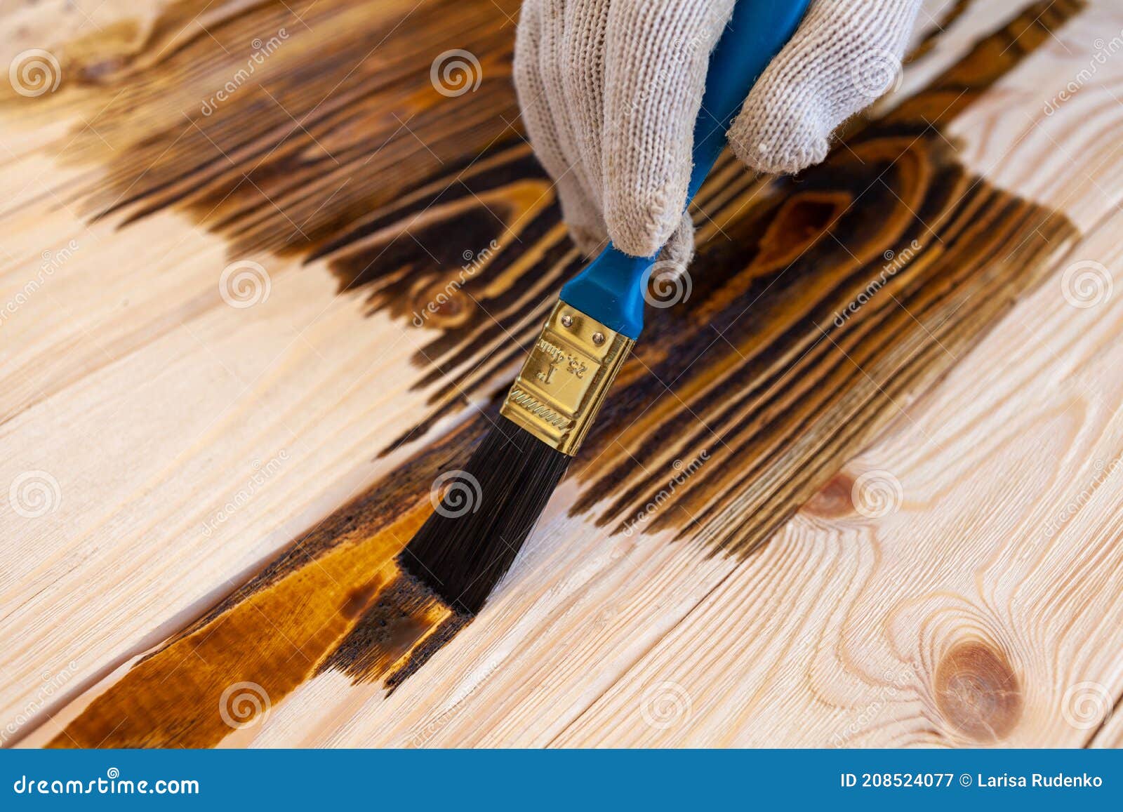 Painting Brushed Wood with a Stained Brush Stock Image - Image of ...