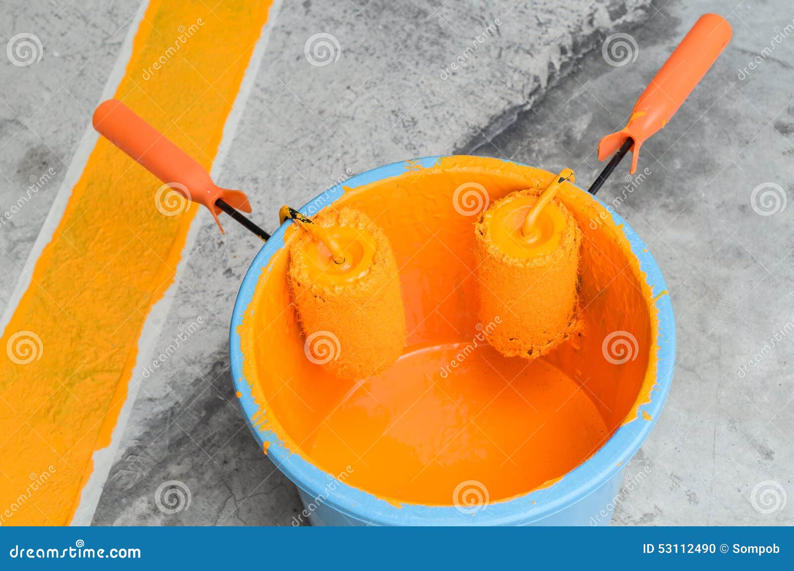 Painting in a Orange Color. Paint Can with Roller Brush Stock Photo ...
