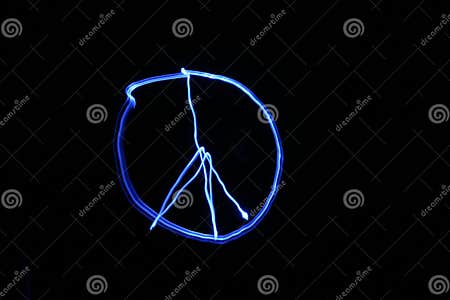 Painting a PEACE Sign with Light Using Time Laps or Bulb Exposure Stock ...