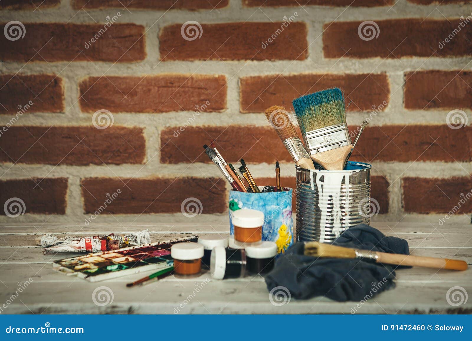 Painting Props on Brick Wall Background Stock Photo - Image of canvas ...