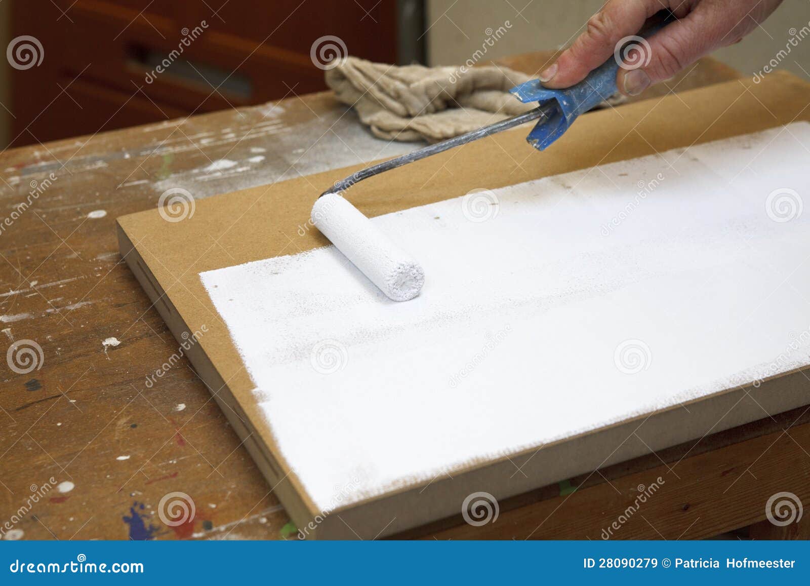 Painting with roller stock image. Image of roller, paint - 28090279