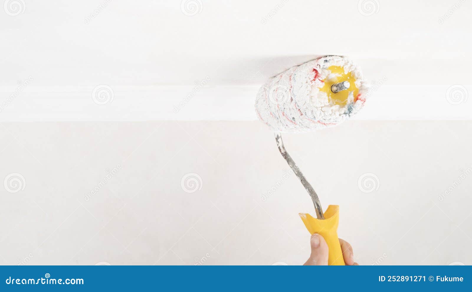 Painting a White Ceiling with a Roller, Home Renovation Stock Image ...