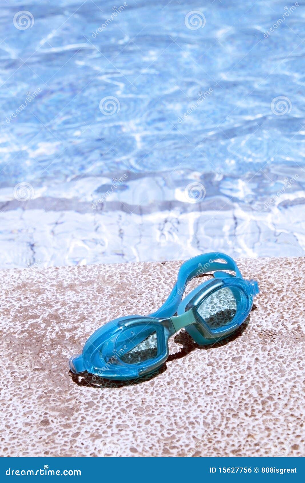 Pair of Blue Goggles by the Pool Stock Photo - Image of plastic, rock ...