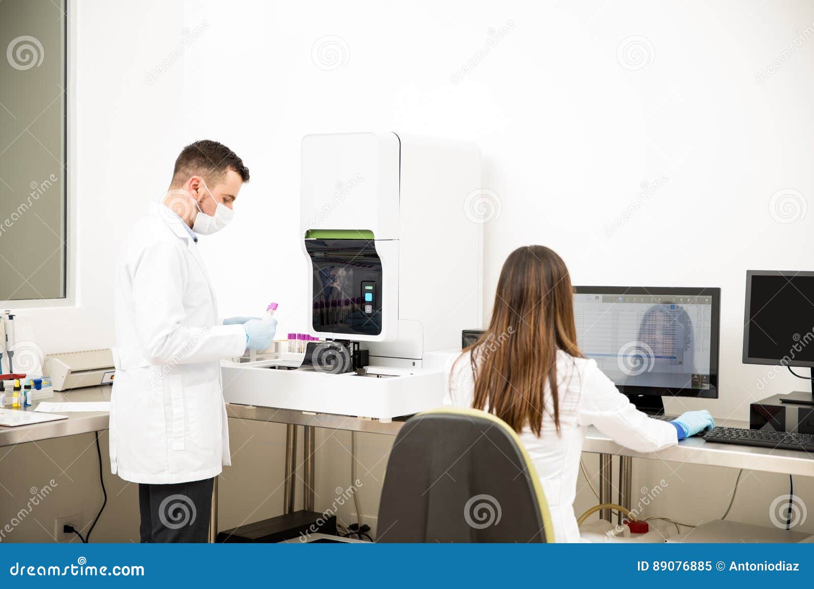 Pair of Chemists Working in a Laboratory Stock Image - Image of ...