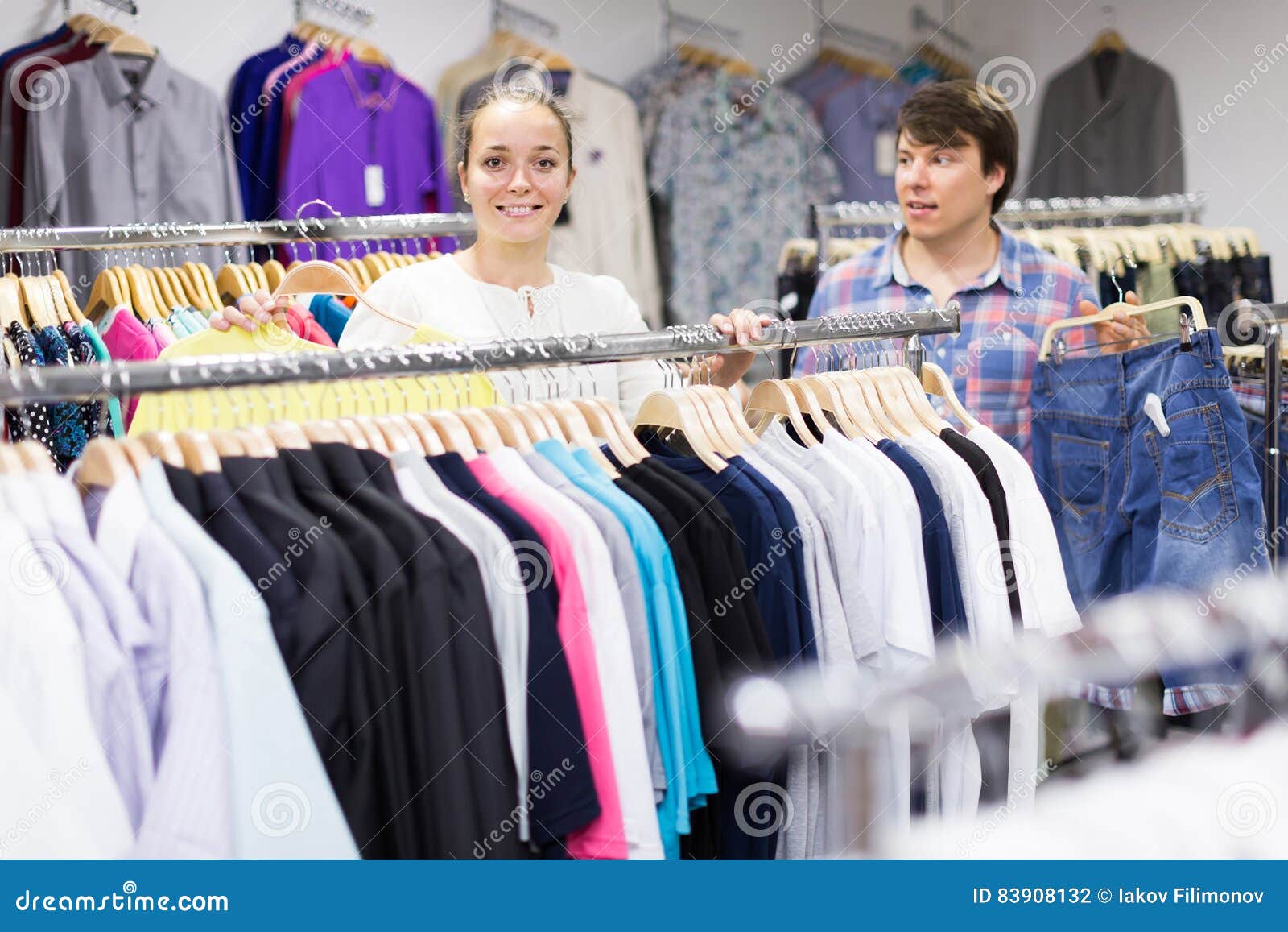 Pair Chooses Clothes at the Store Stock Photo - Image of fashion ...
