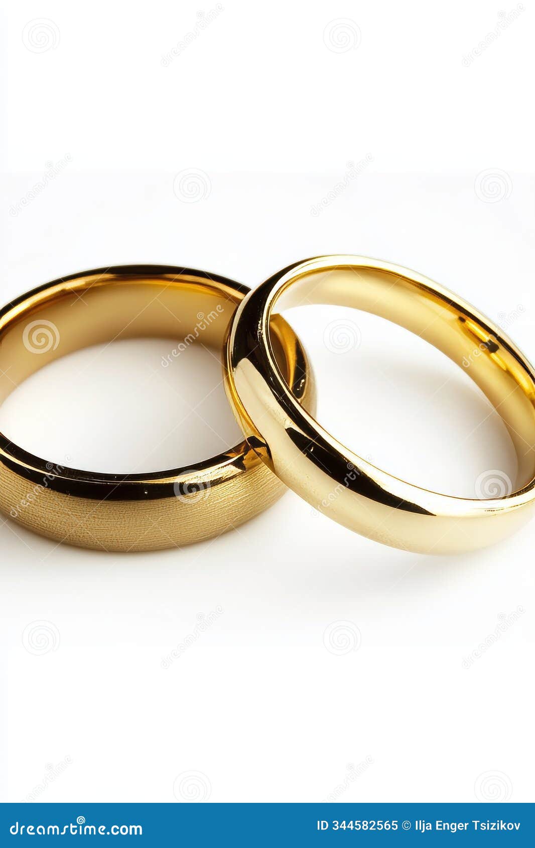 Pair of Classic Gold Wedding Rings on a White Background, Symbolizing ...