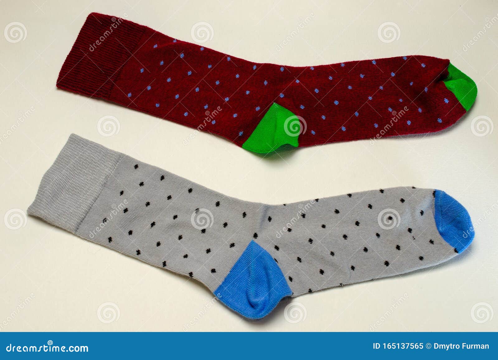 Pair of Colorful Socks of Different Colors, Lie on White Surface. Not ...