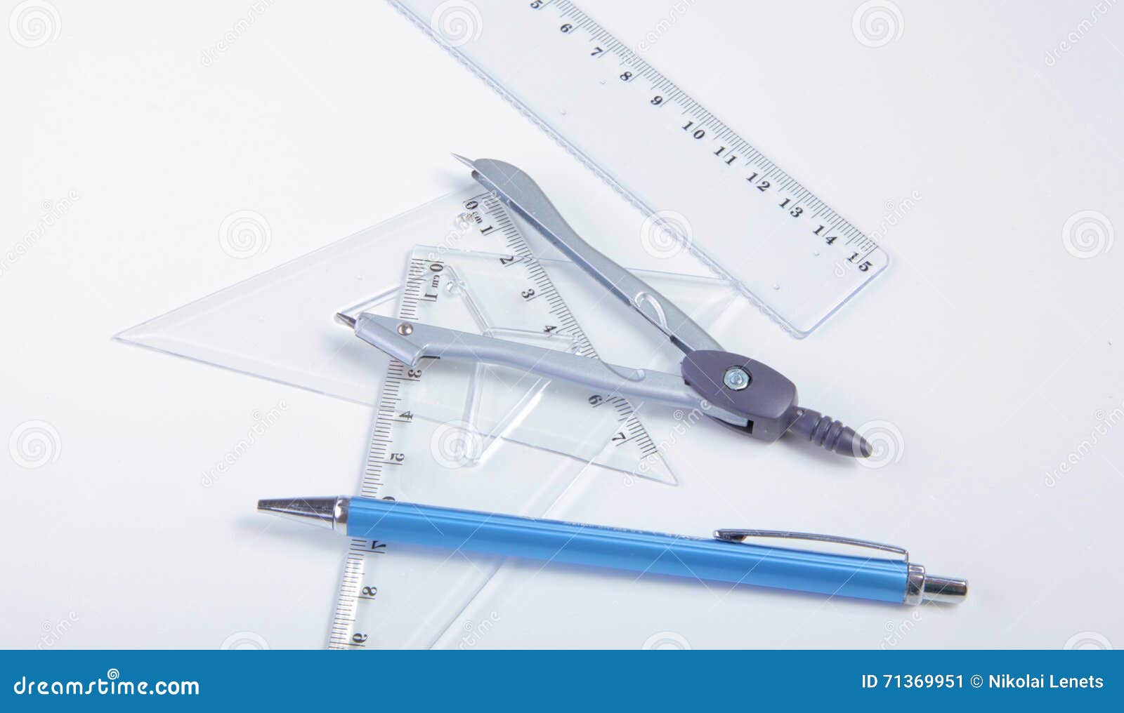 Pair of Compasses Drawing Circle on a Paper Stock Image - Image of ...