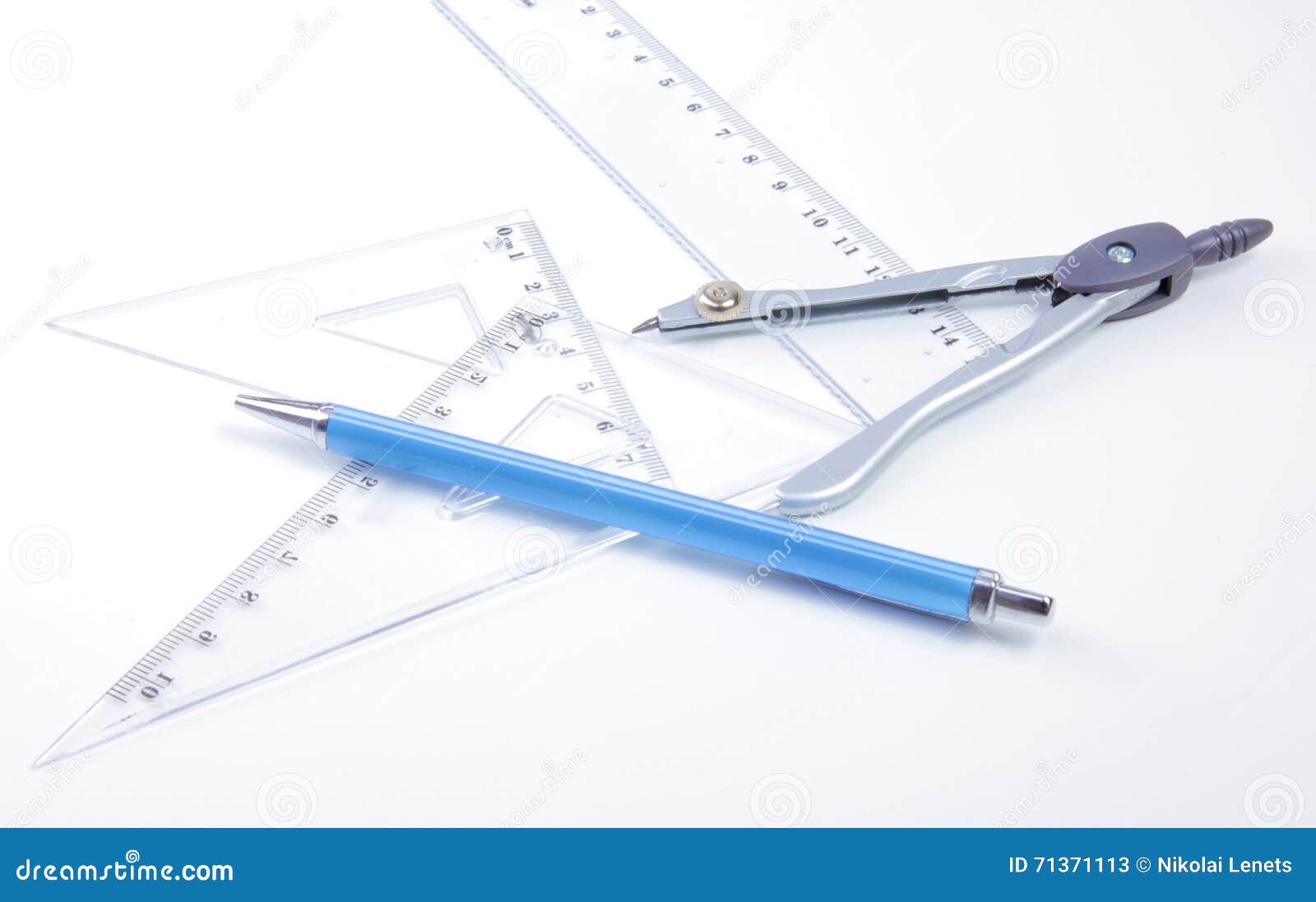 Pair of Compasses Drawing Circle on a Paper Stock Image - Image of ...