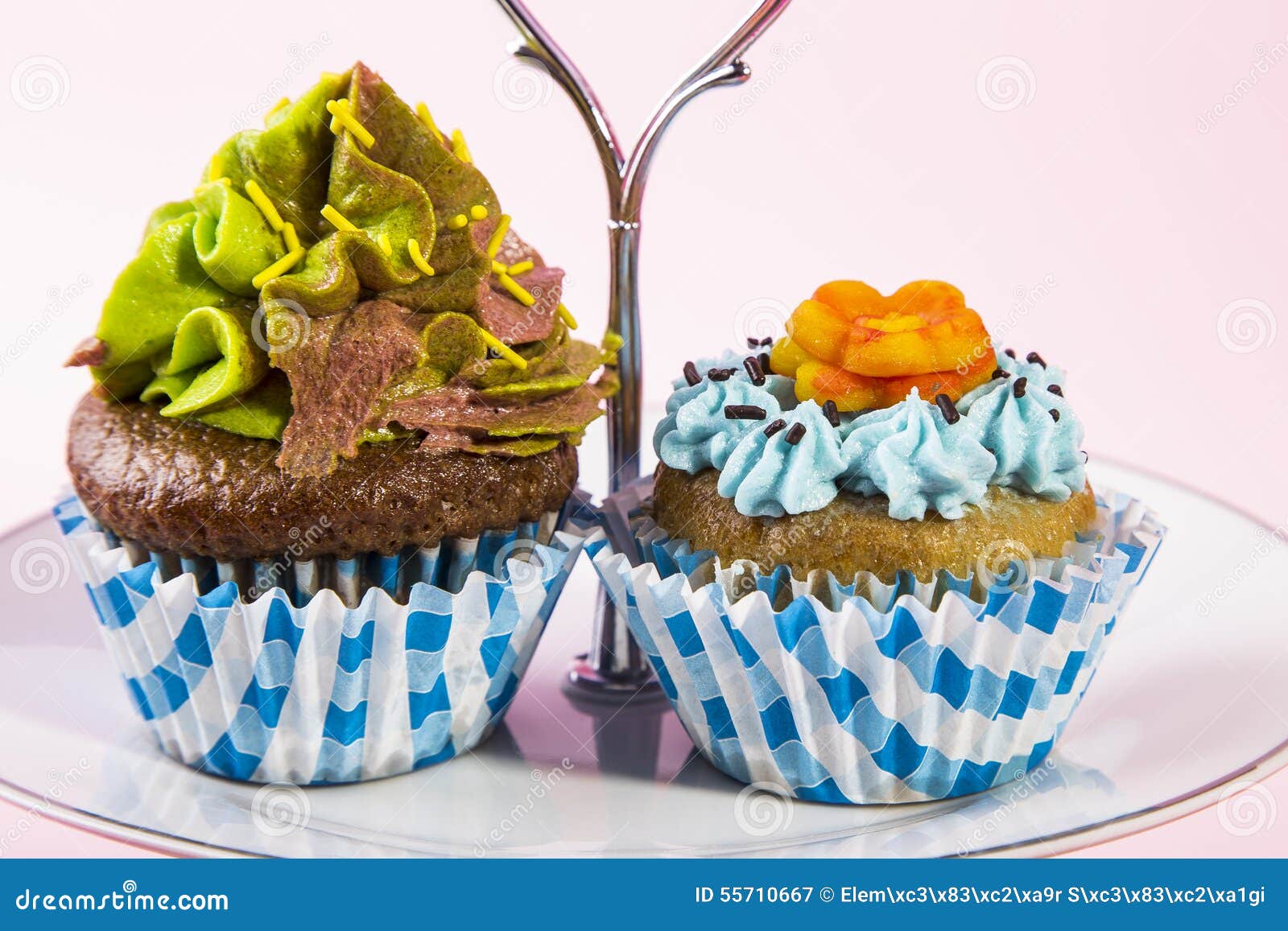 Pair of cupcakes stock image. Image of edible, elegant - 55710667