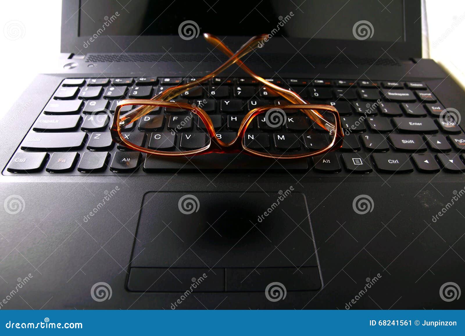 Pair of Eyeglasses on a Computer Keyboard Stock Image - Image of frame ...