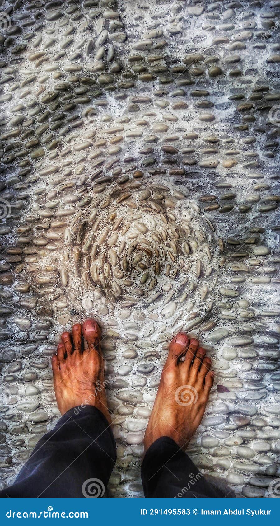 A Pair of Feet on a Floor with a Unique Texture and Edited Colors Stock ...