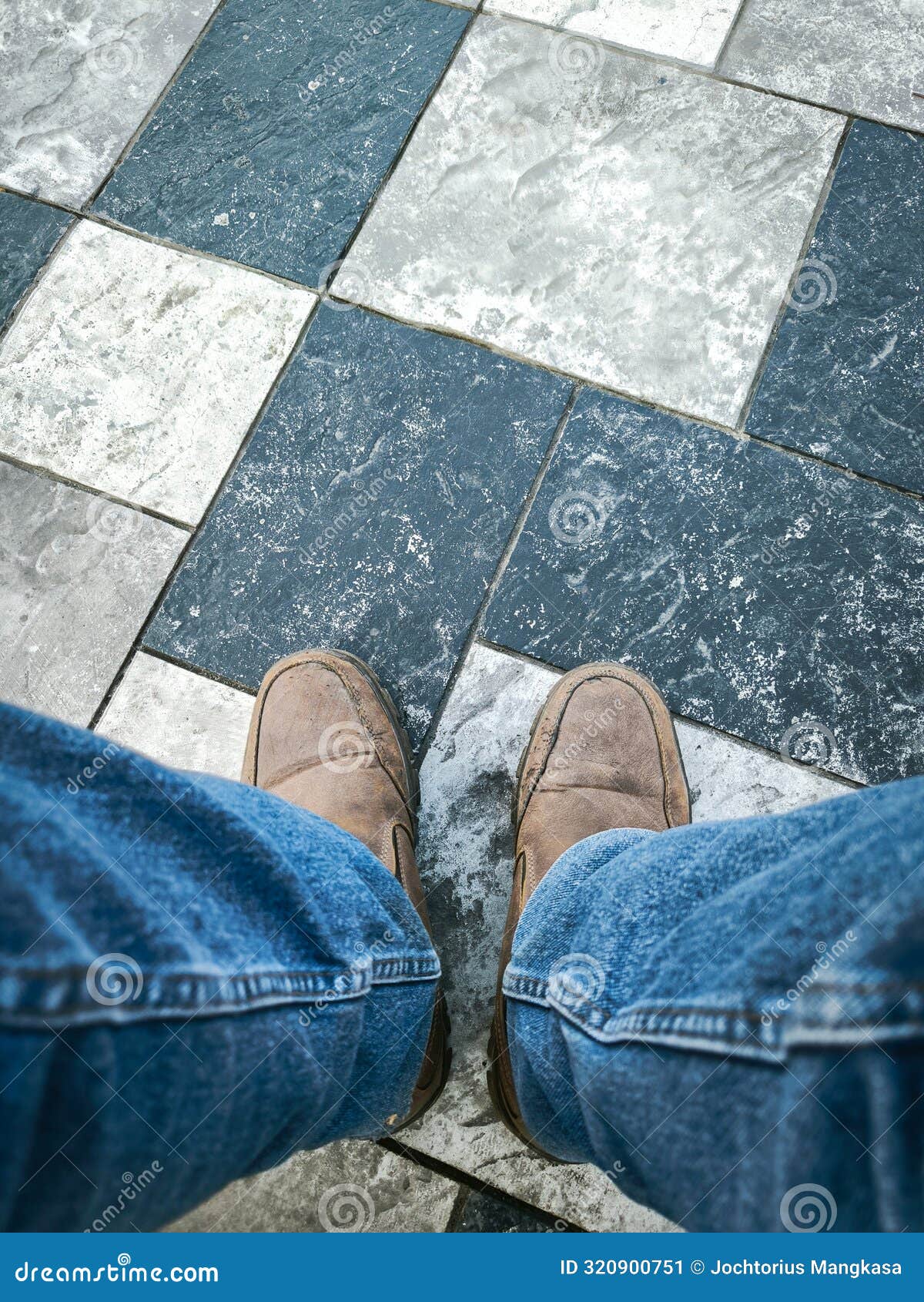 Pair of Feet in Jeans and Shoes on Tile Floor Stock Image - Image of ...