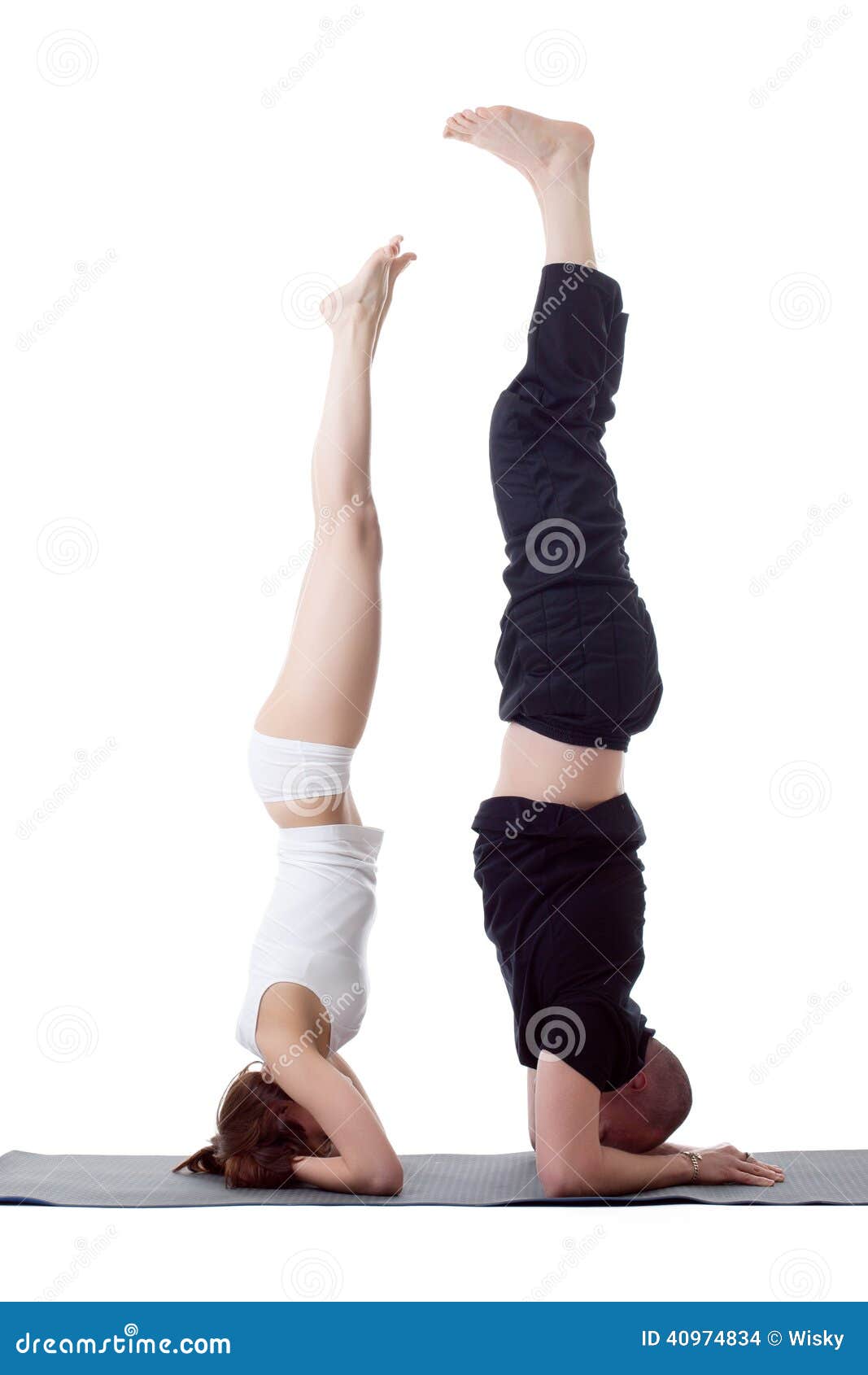 Pair of Flexible Yoga Trainers Doing Handstand Stock Photo - Image of ...